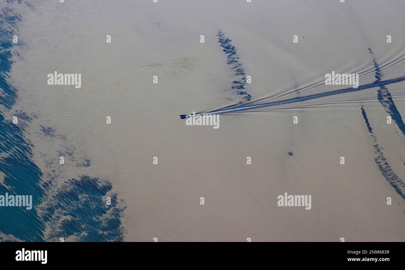 An aerial photo shows a large volume of volcanic pumice stones floating ...