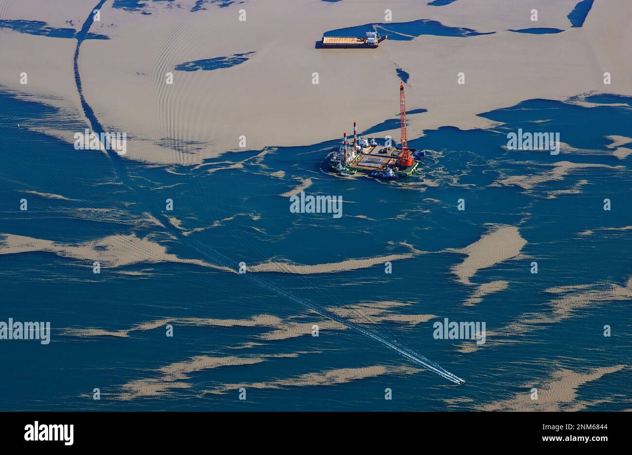 An aerial photo shows a large volume of volcanic pumice stones floating ...