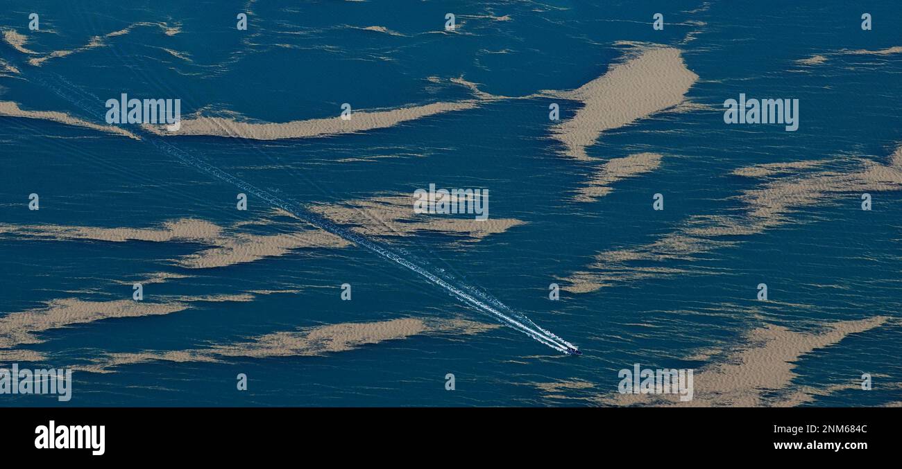 An aerial photo shows a large volume of volcanic pumice stones floating ...