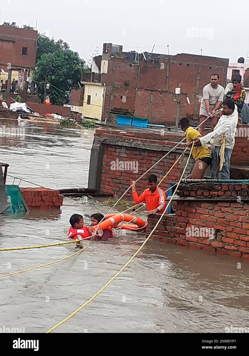 This photograph provided by India's National Disaster Response Force (NDRF) shows NDRF soldiers ...
