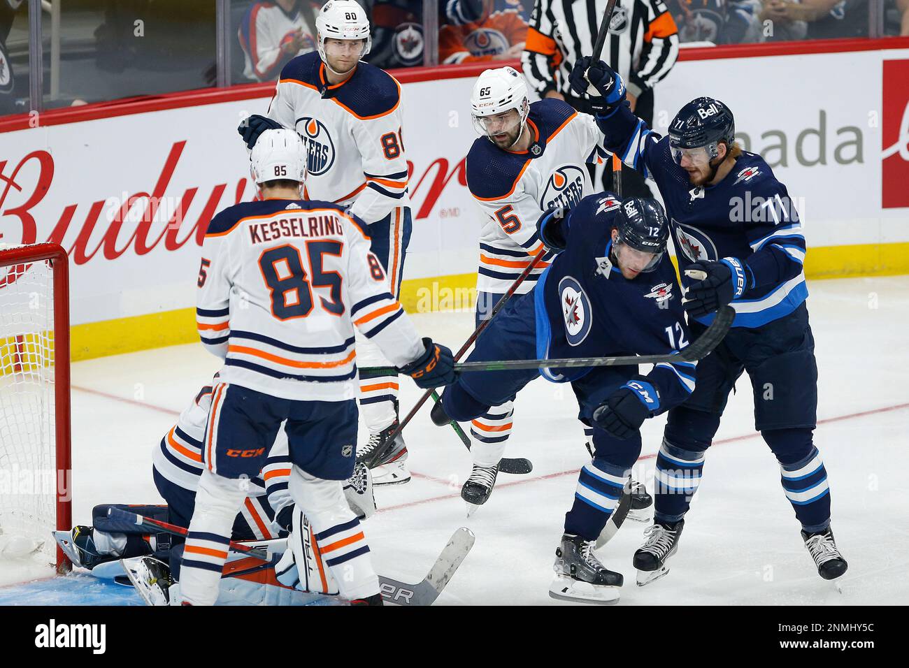 Winnipeg Jets' Jansen Harkins (12) scores against the Edmonton Oilers ...