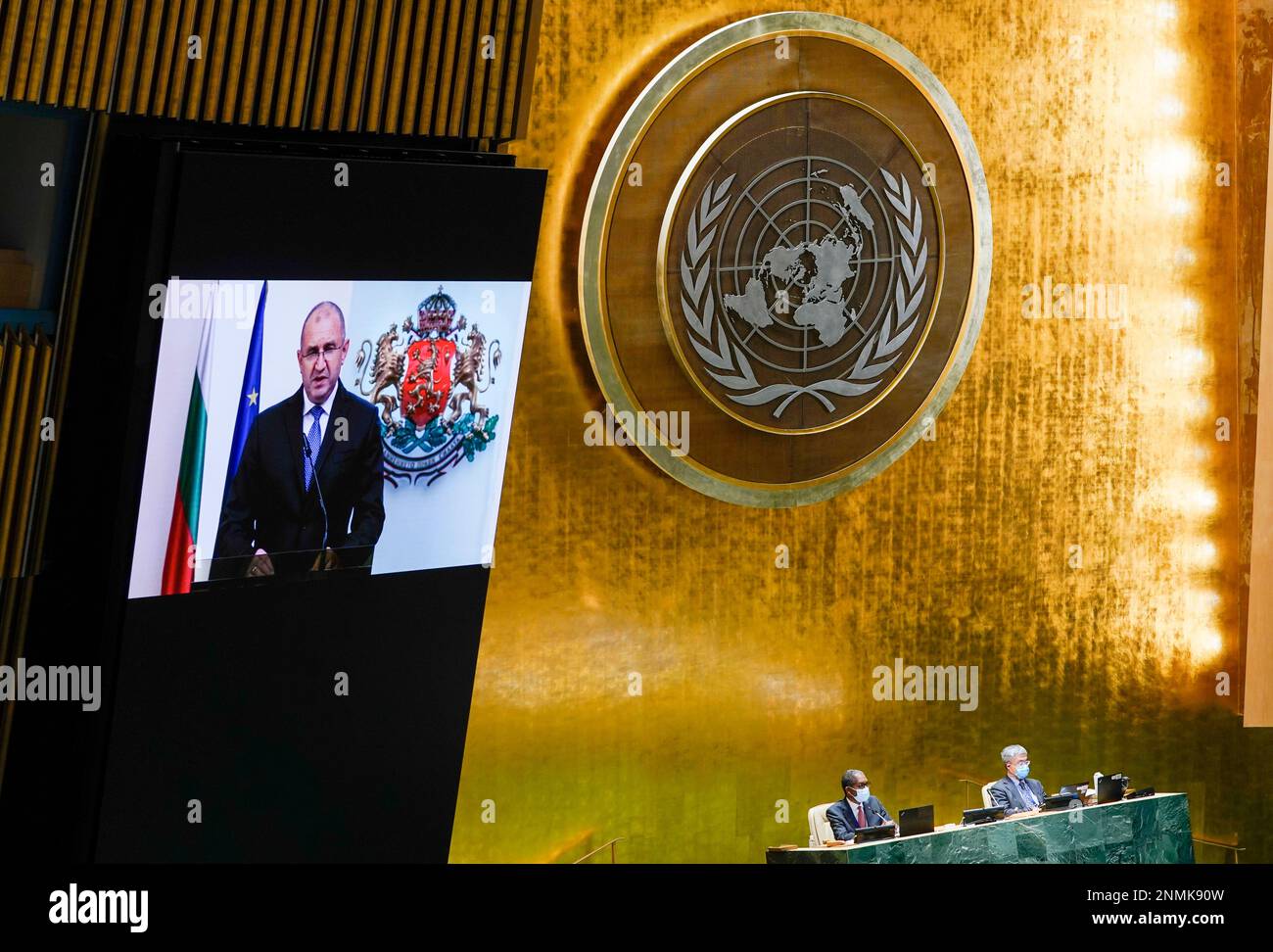 Bulgaria's President Rumen Radev is seen on a video screen as he ...