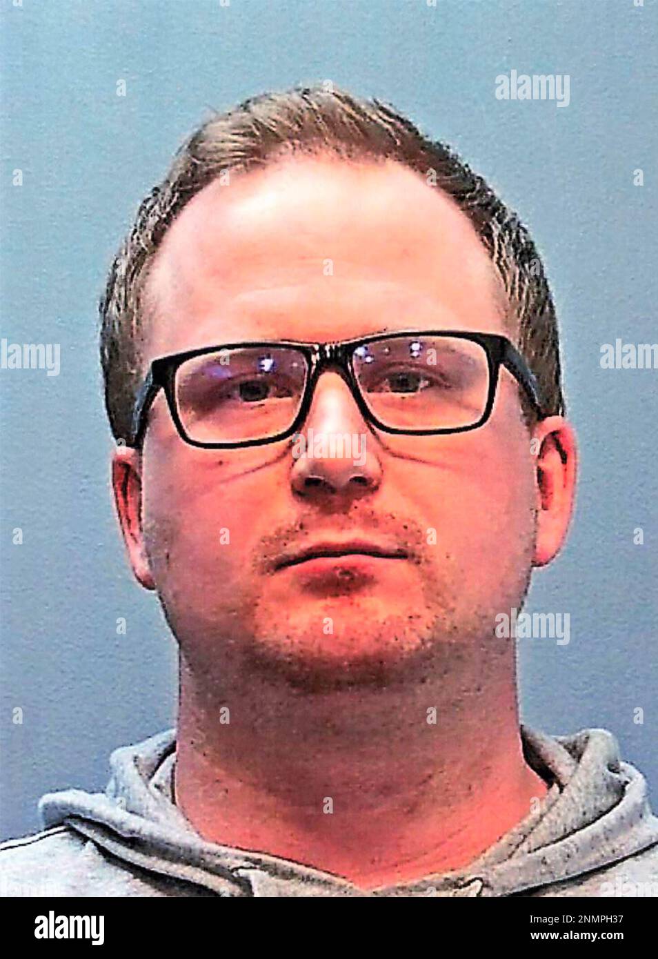 This undated booking photo provided by the Glendale Police Department ...