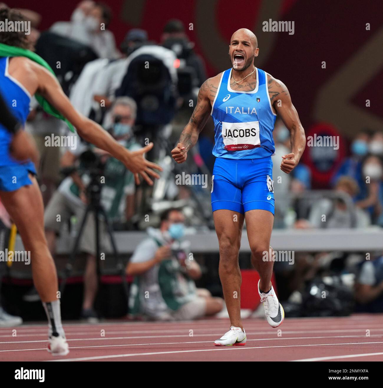 JACOBS Lamont Marcell of Italy reacts after winning Athletics men's ...