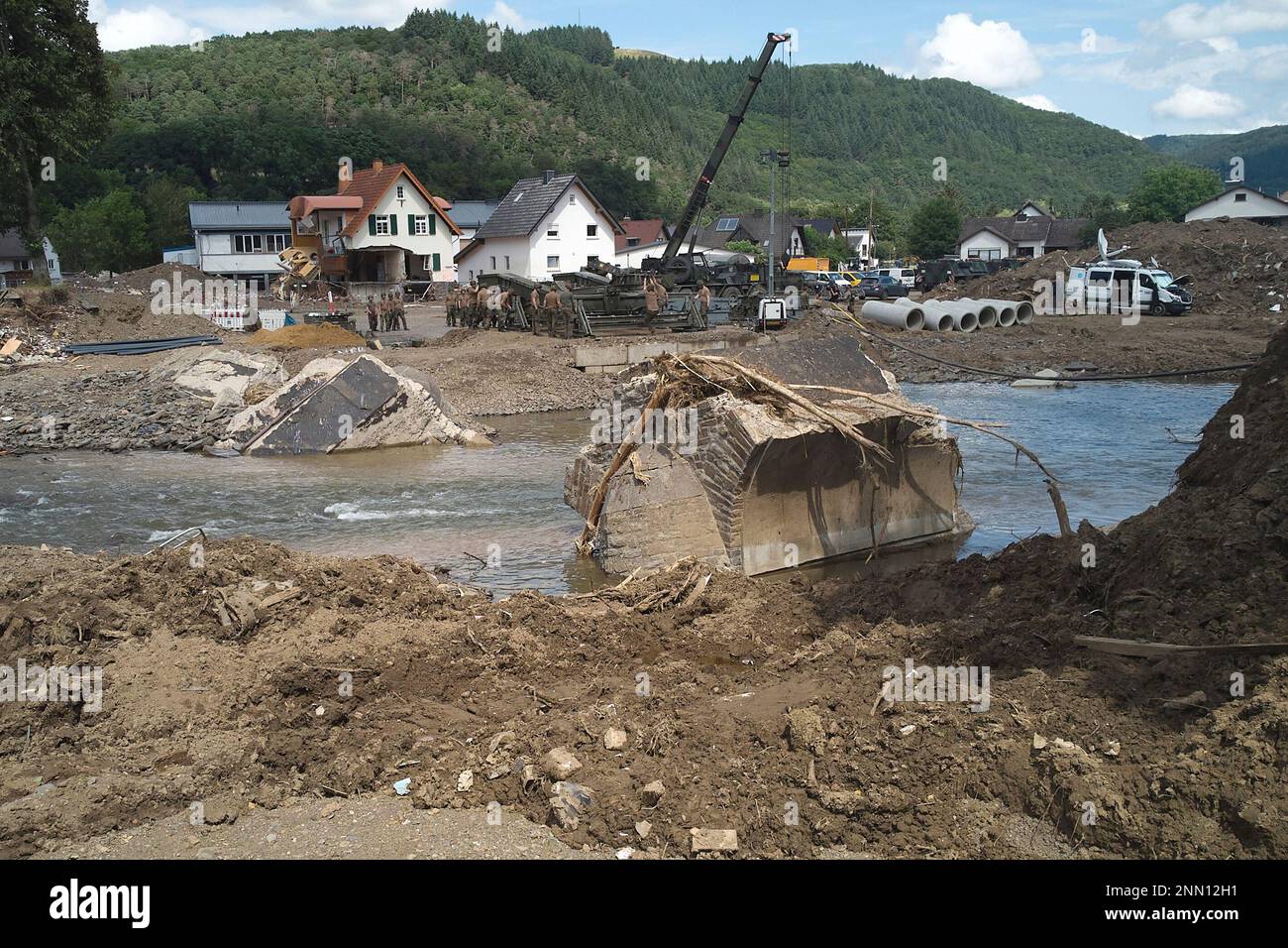 German Armed Forces Begin To Erect A Temporary Bridge Over The River