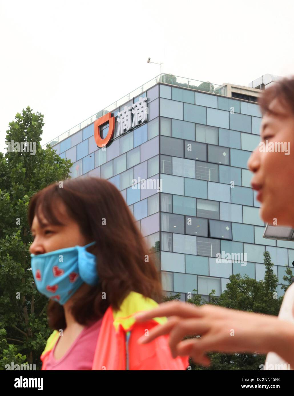 A photo shows the logo of Didi Chuxing Technology Co. in Beijing, China ...