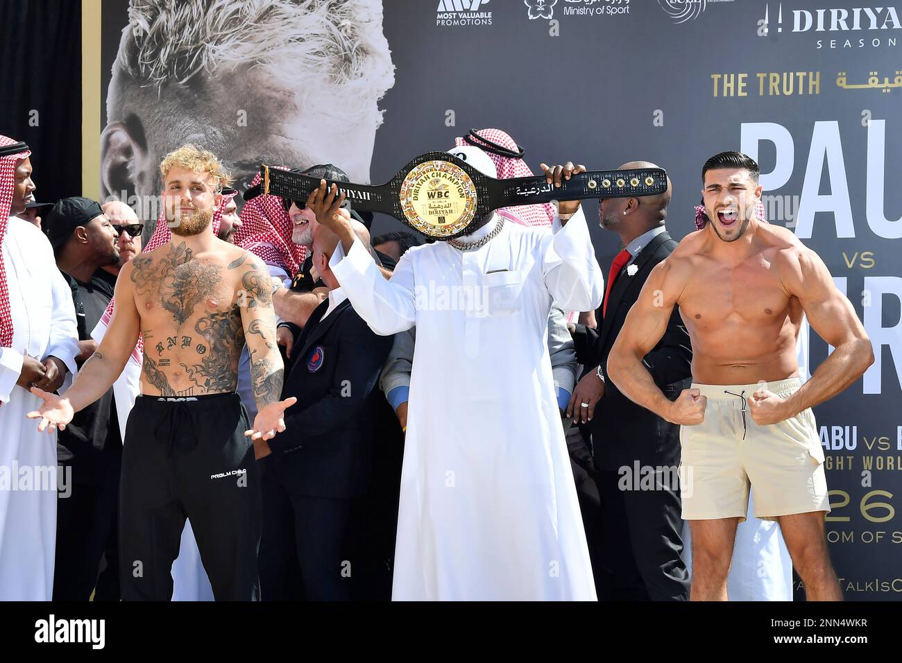 Jake Paul, left, and Tommy Fury, pose after a weigh-in, a day before ...