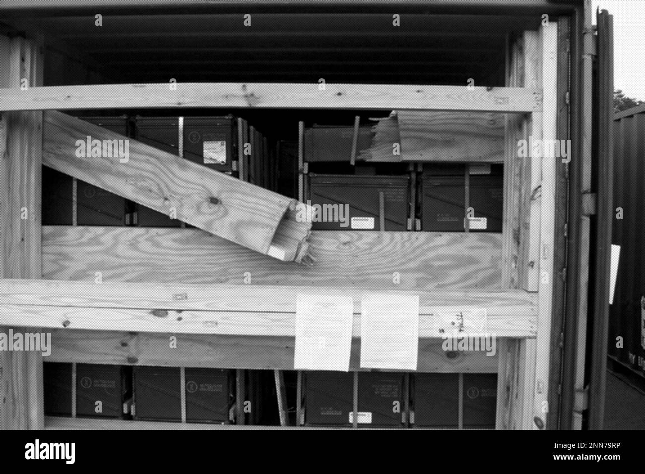 A photo illustration of a rail car containing explosive ordnance shows ...