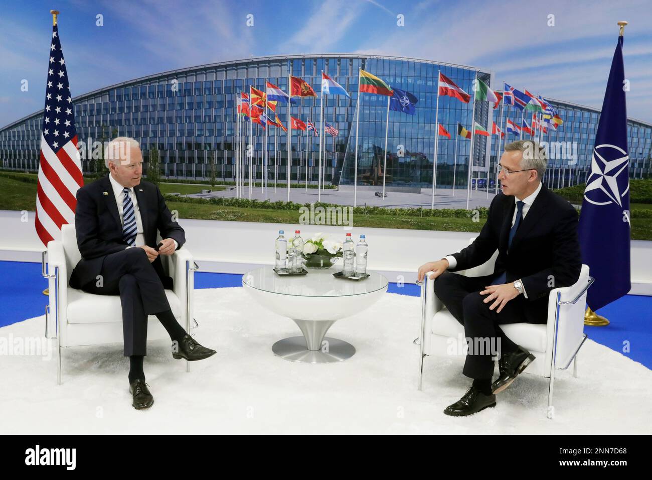 NATO Secretary General Jens Stoltenberg speaks with U.S. President Joe ...
