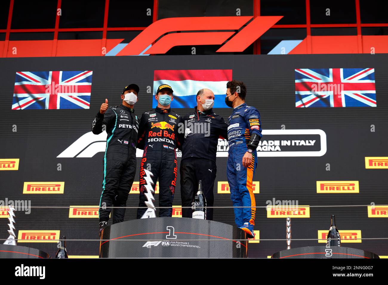 From left, second placed Mercedes Lewis Hamilton, first placed Red Bull ...