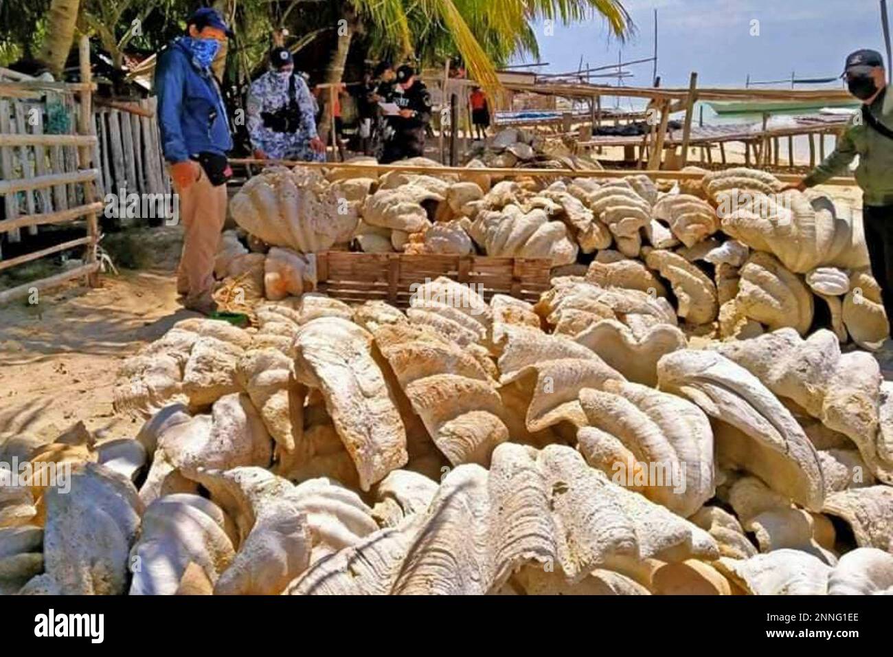 In this photo provided by the Philippine Coast Guard, a policemen and ...