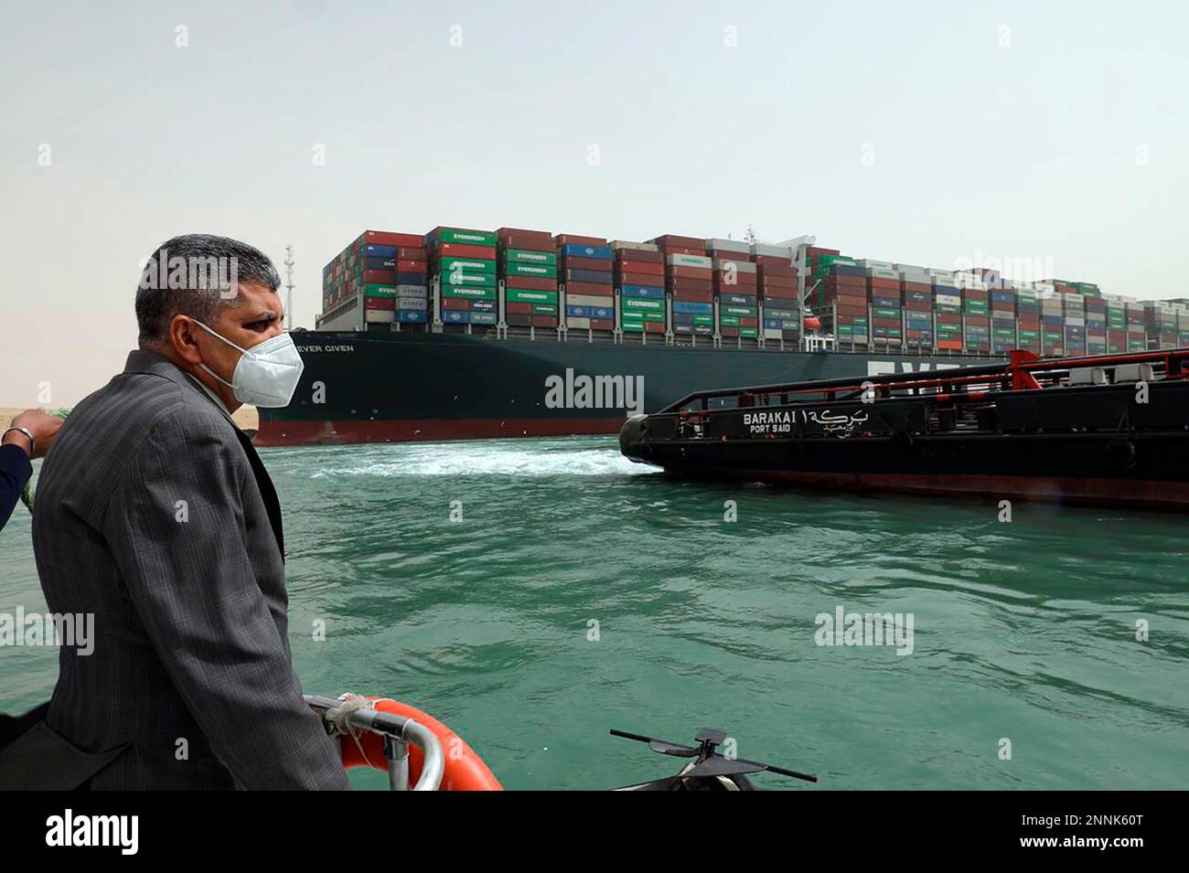 This photo released by the Suez Canal Authority on Thursday, March 25, 2021, shows Lt. Gen ...