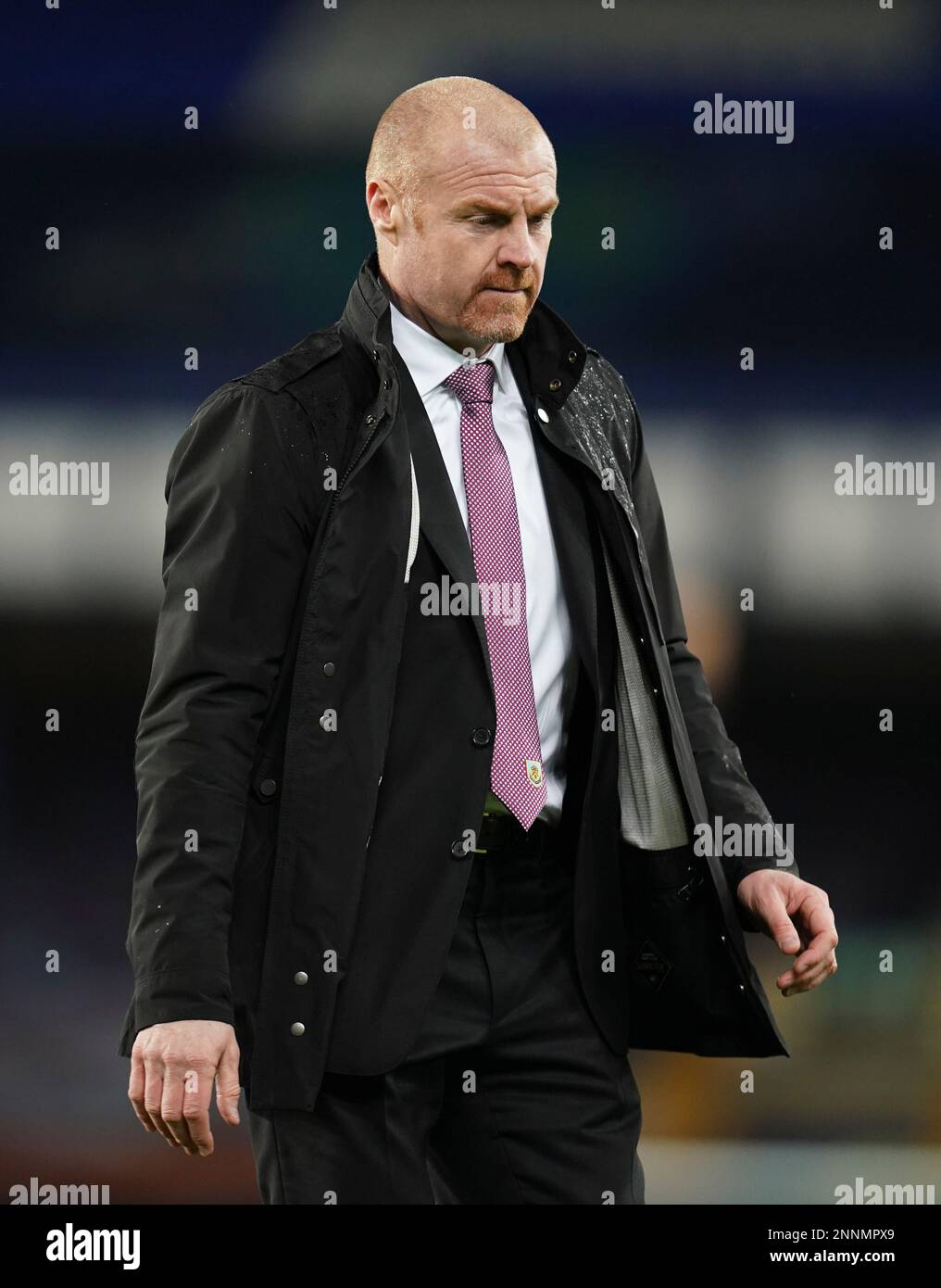 Burnley's manager Sean Dyche walks on the pitch at the end of the ...