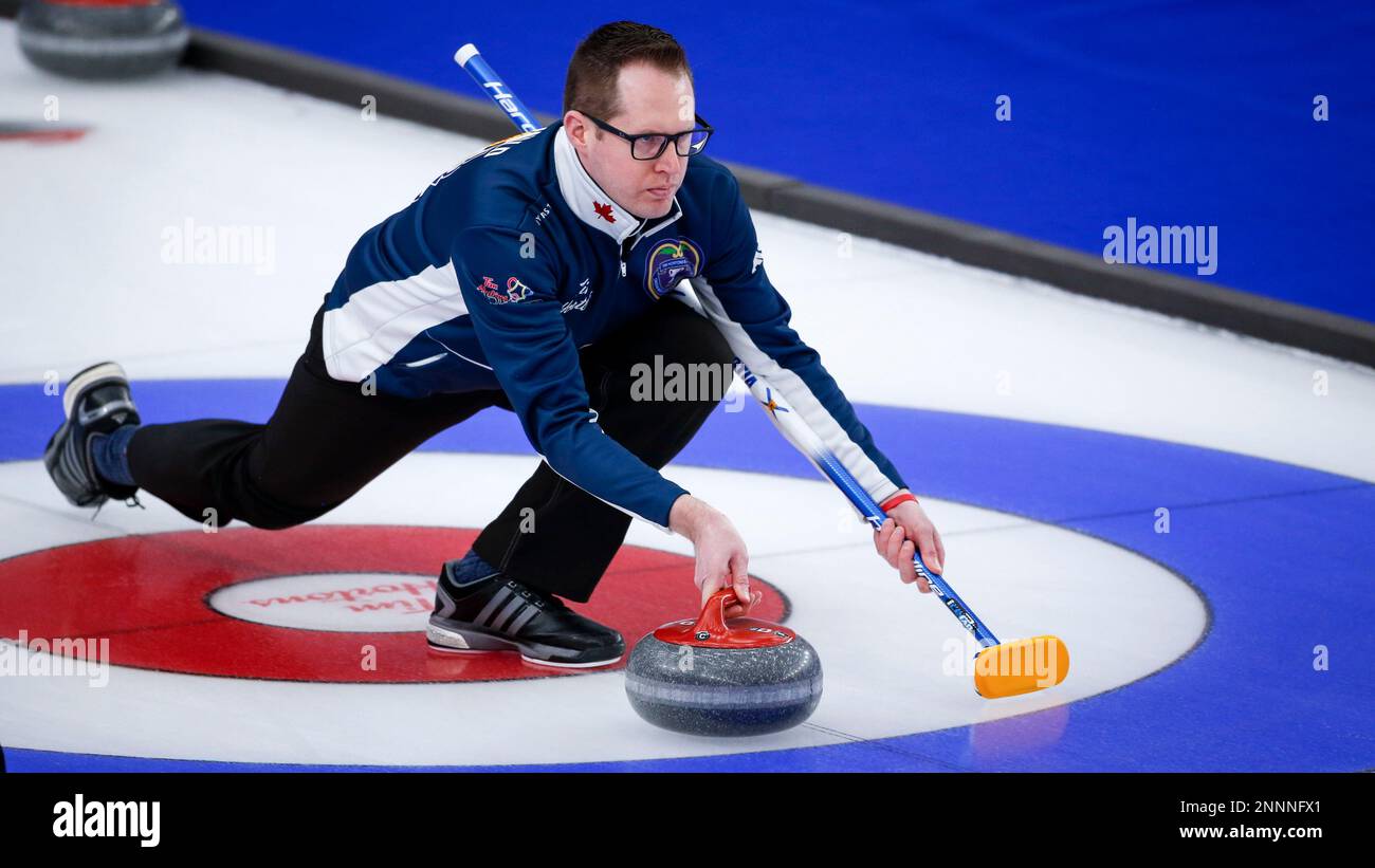 Team Nova Scotia skip Scott McDonald takes a shot as he plays Team ...