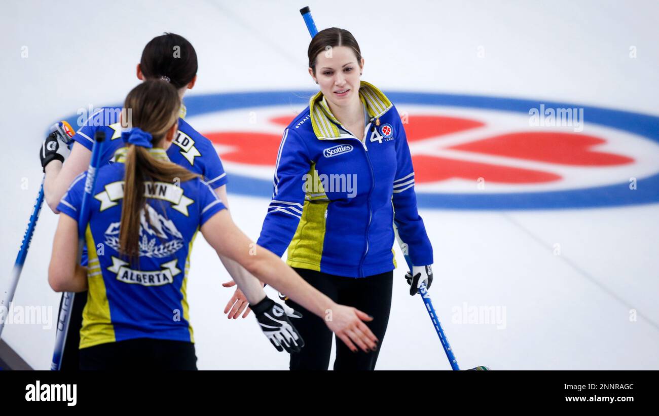 Team Alberta skip Laura Walker, right, celebrates a shot with teammates ...
