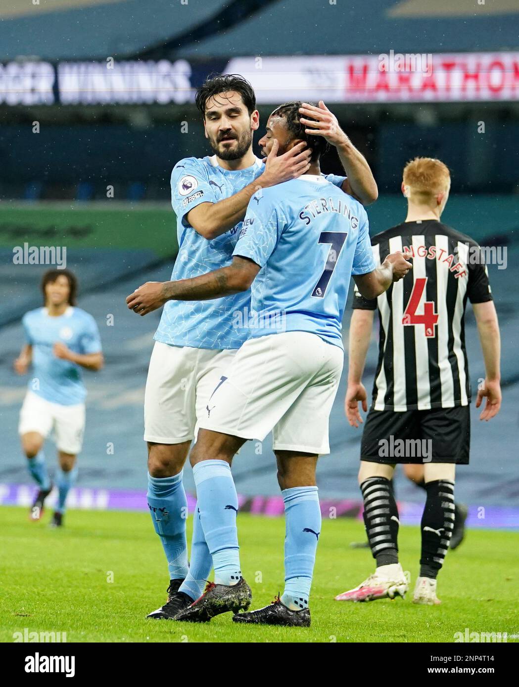 Manchester City's Ilkay Gundogan celebrates with Raheem Sterling, right ...