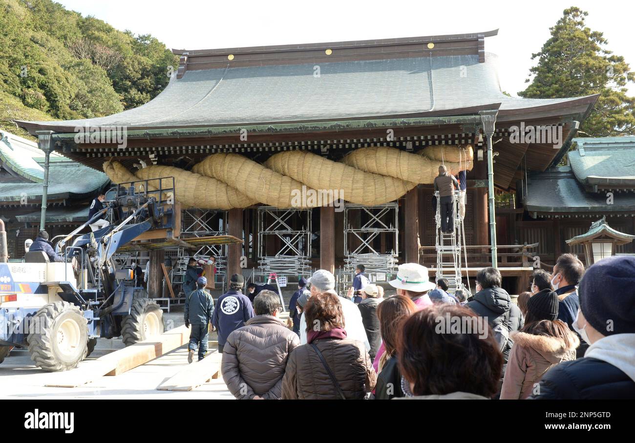 O-shimenawa, a huge sacred Shinto rice straw festoon, is set on the ...