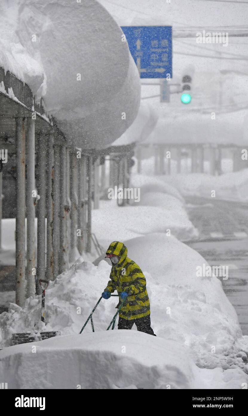Yuzawa Town is hit by heavy snowfall in Niigata Prefecture on December ...