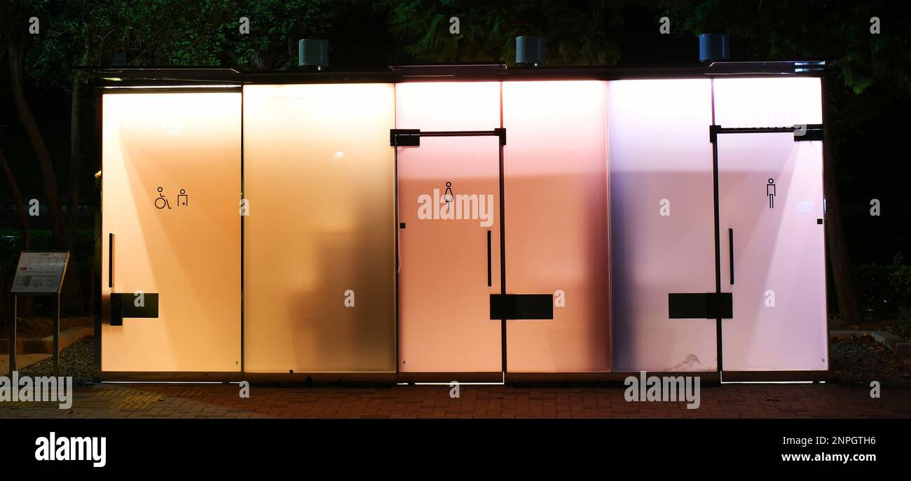 A photo shows a glass-enclosed toilet at Yoyogi Fukamachi Park in ...