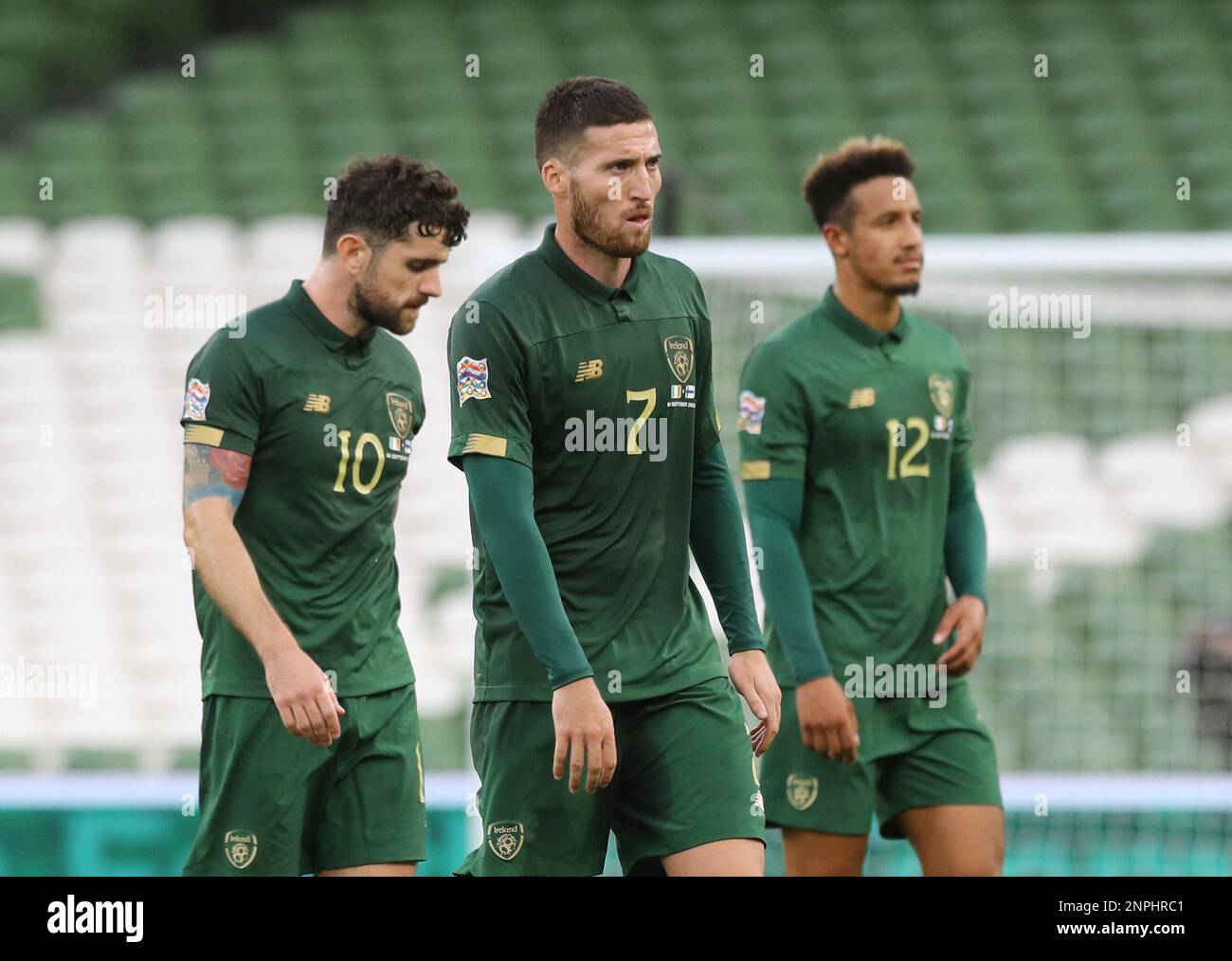 Ireland's Robbie Brady, left, with temmates Matt Doherty, center and ...