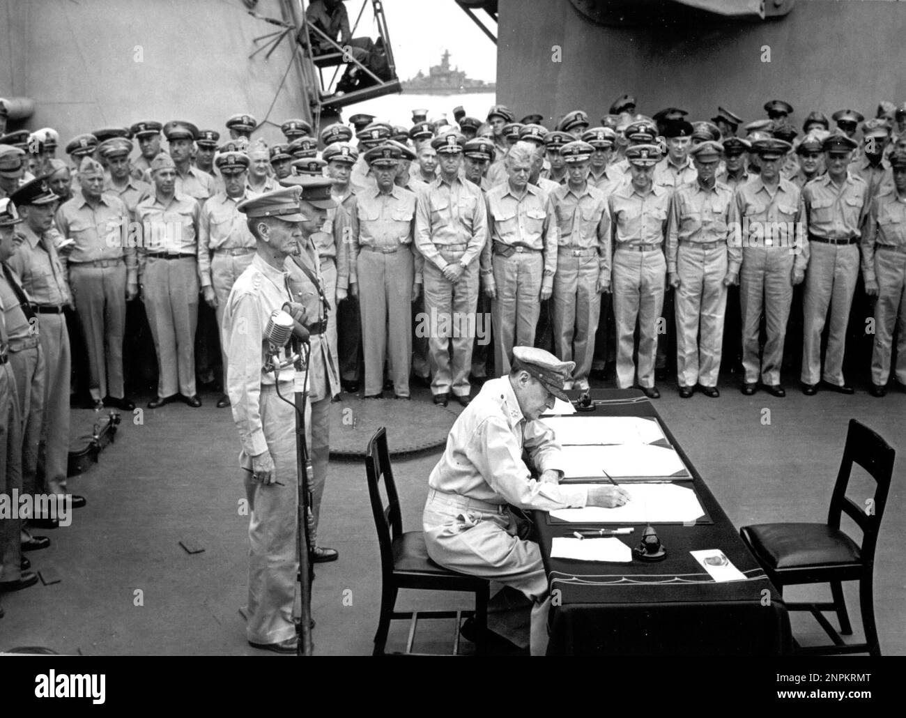 FILE - Gen. Douglas MacArthur signs the Japanese surrender documents on ...