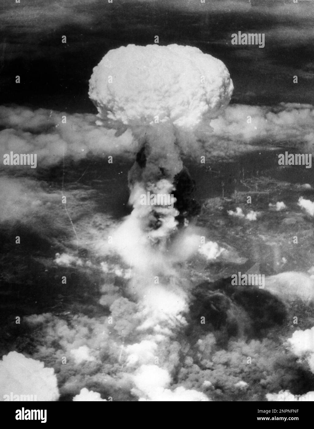 FILE - In this Aug. 9, 1945, file photo, a giant column of smoke rises ...