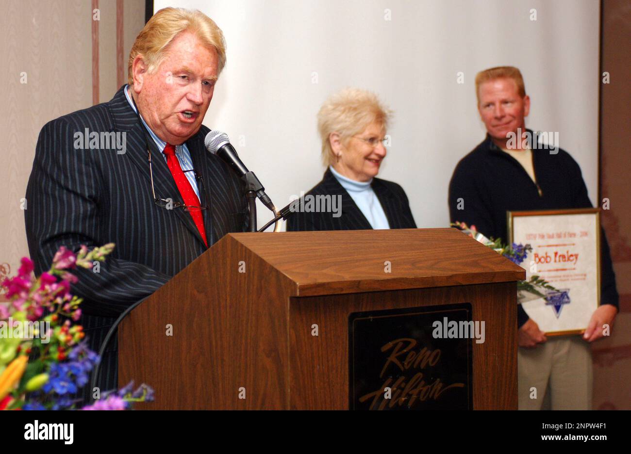 Bob Fraley is flanked by his wife Elaine Fraley and son Doug Fraley ...