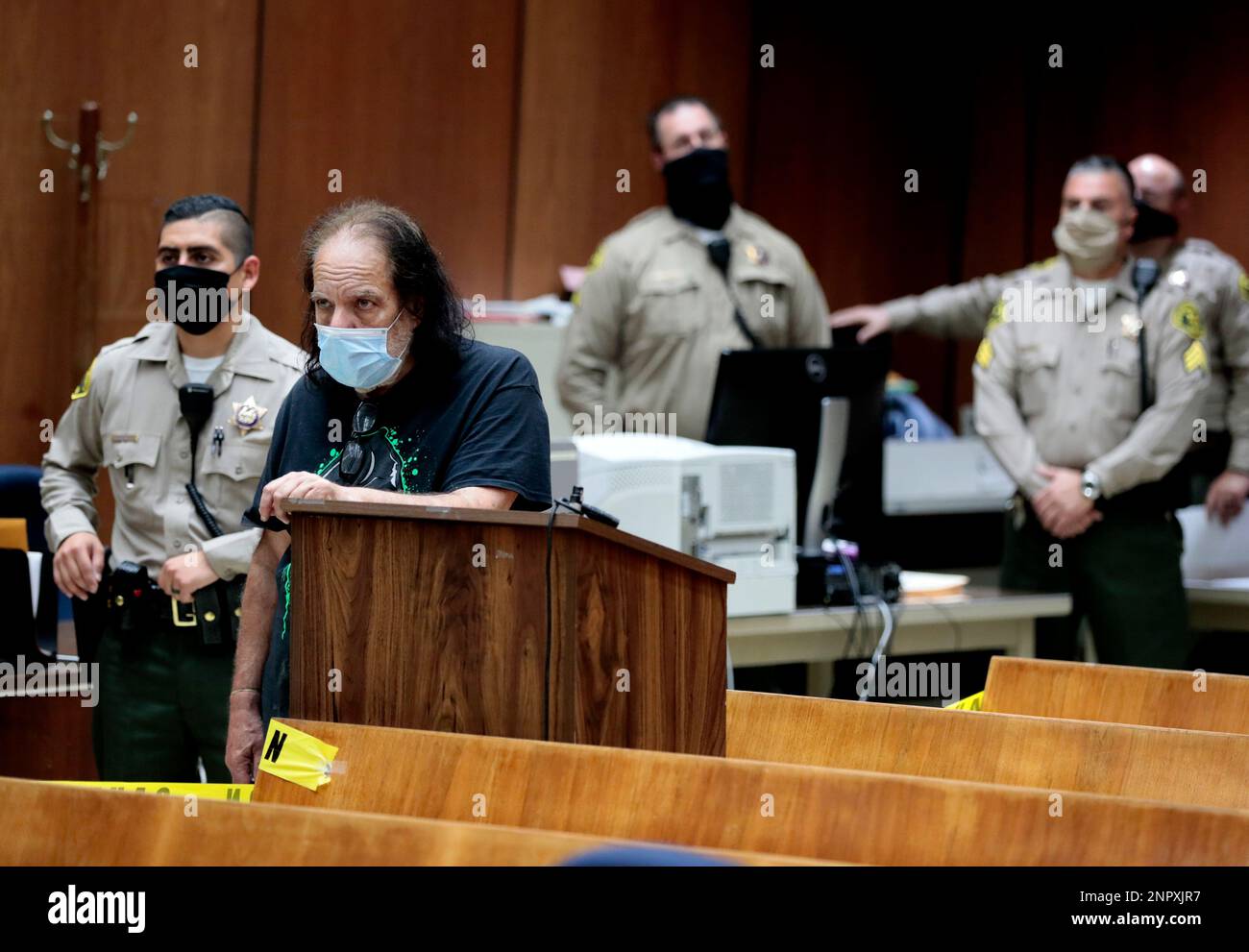 Adult film star Ron Jeremy, second from left, makes his first court ...