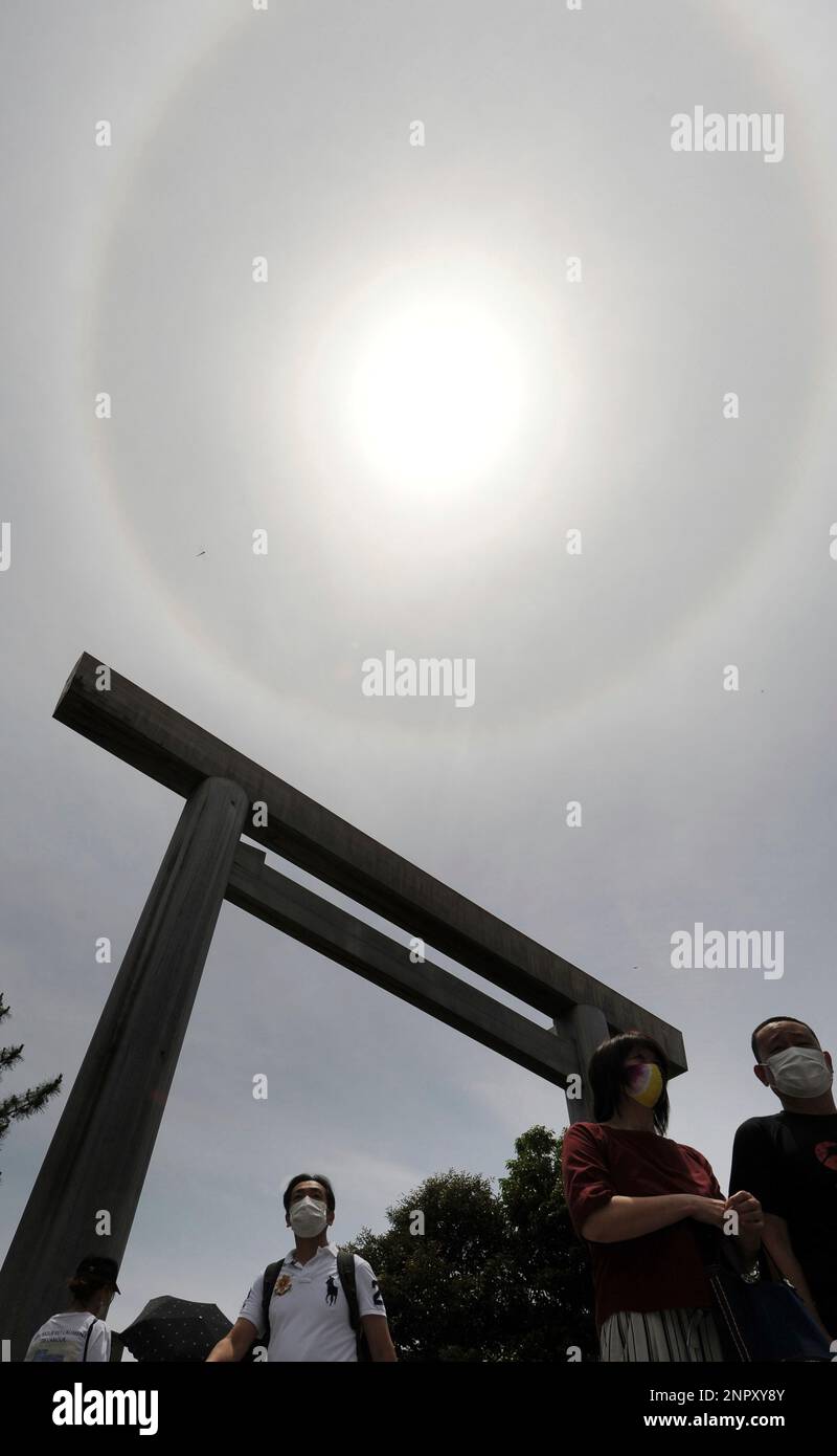 The circumzenithal arc is seen over shrine gate of the Ujibashi Bridge ...