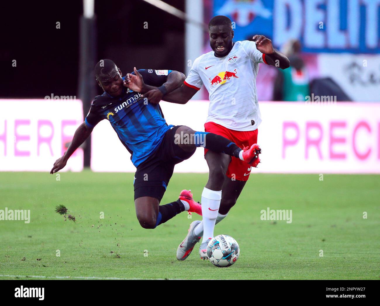 RB Leipzigs Dayot Upamecano, right, in action against SC Paderborns ...