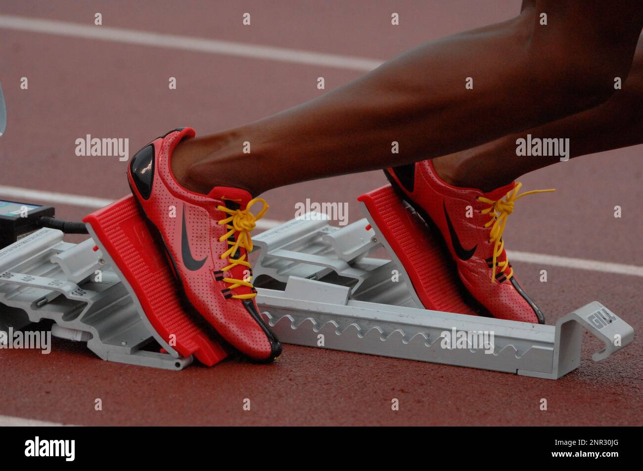 Sheena Johnson aka Sheena Tosta takes her marks in the starting blocks ...