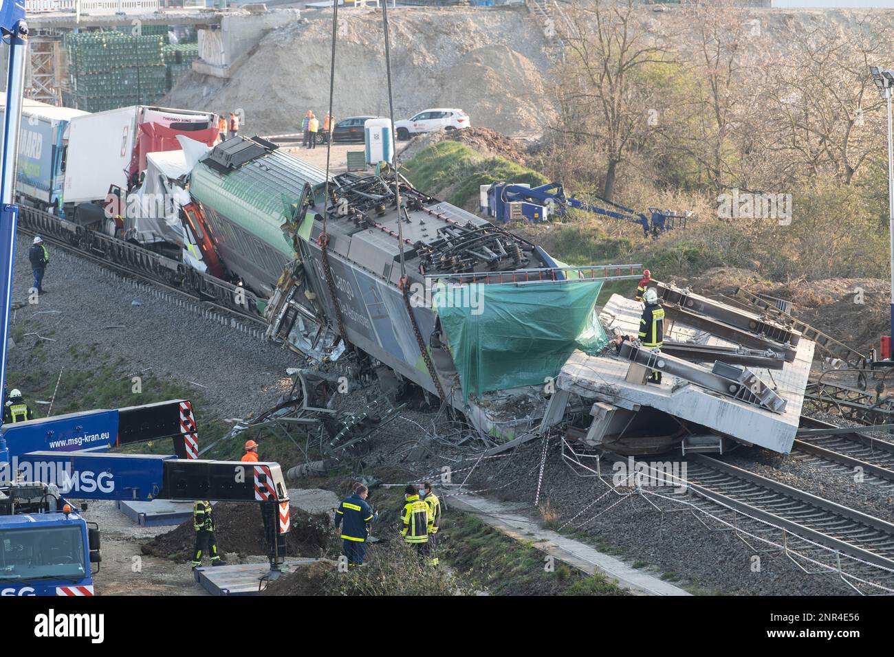 Emergency personnel work at the scene of a freight train accident in ...