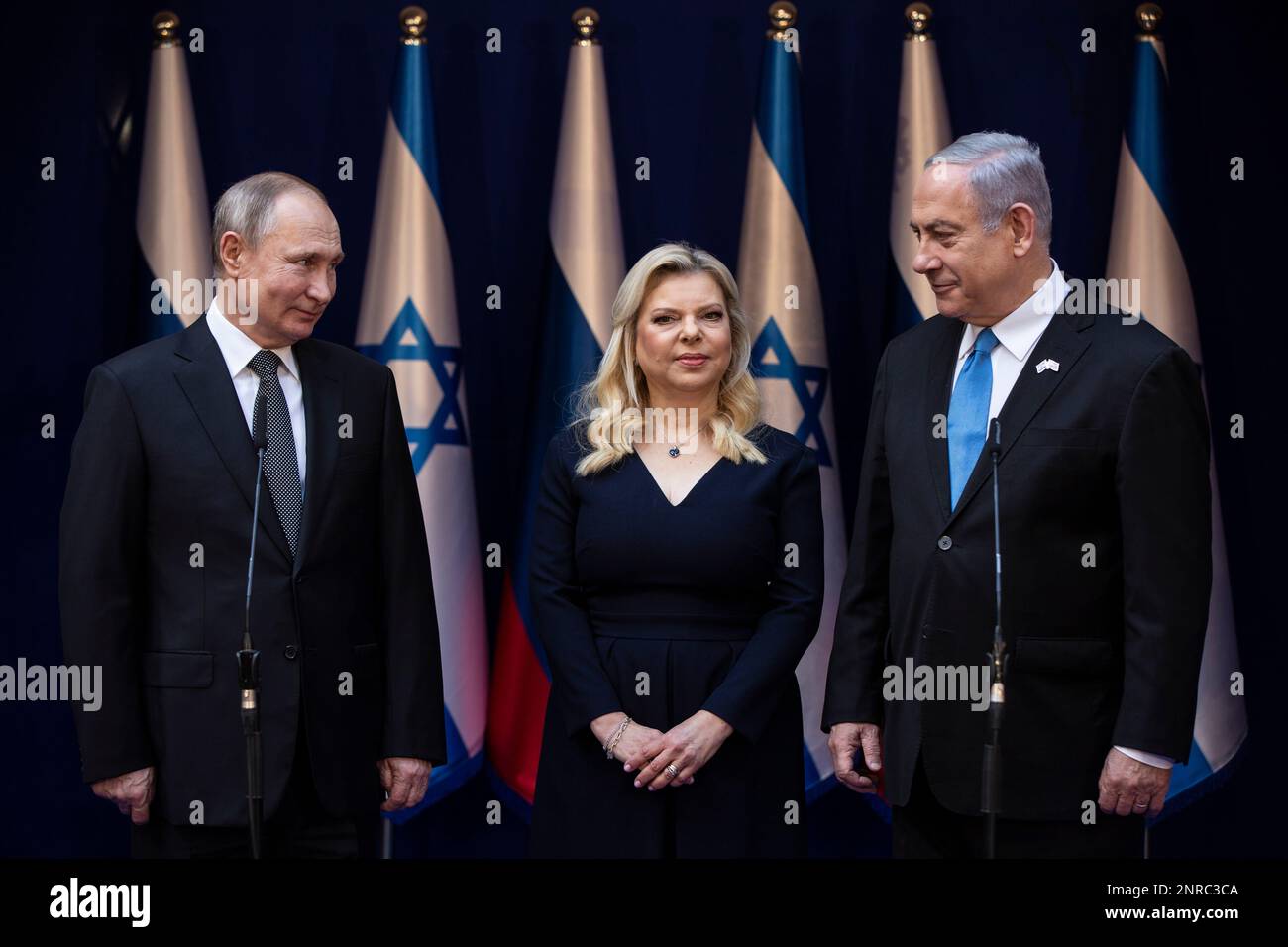 Israeli Prime Minister Benjamin Netanyahu and his wife Sarah stand with President Vladimir Putin ...