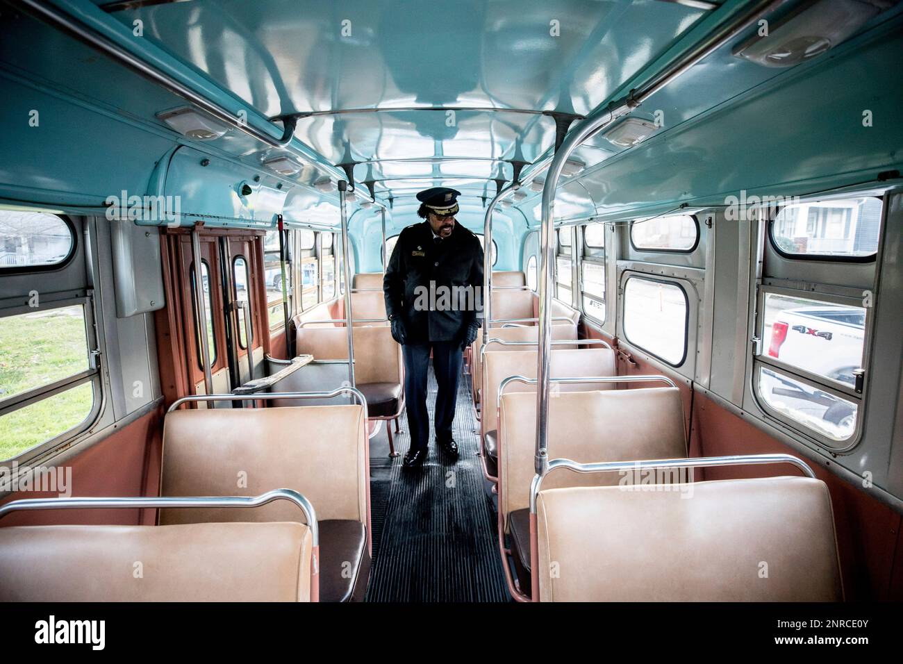 MARTA driver Cory Dumas, Jr inspects a 1950s era bus similar to the bus ...