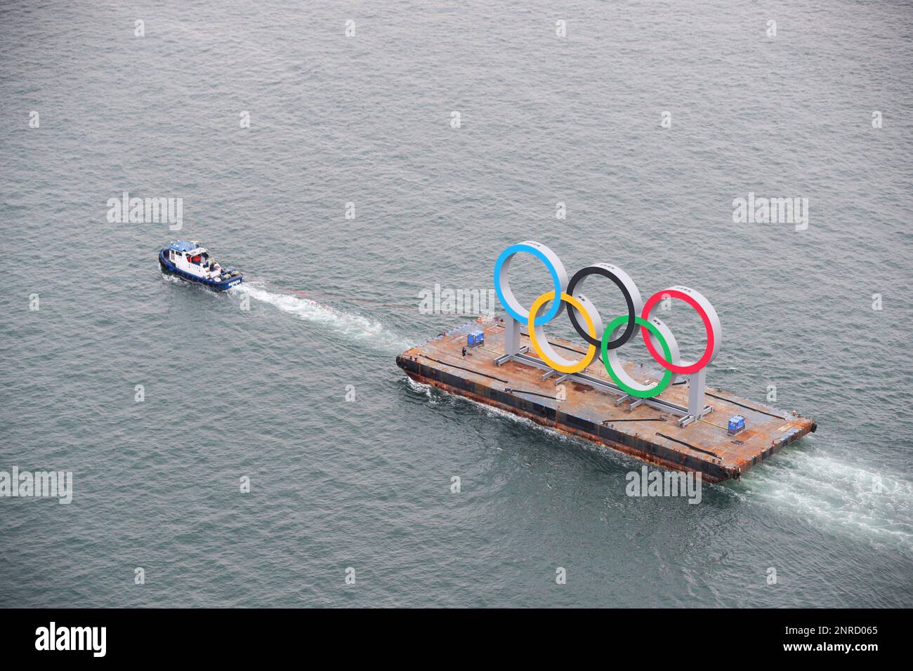 An aerial photo shows a monument of five-ring emblem transported by ...