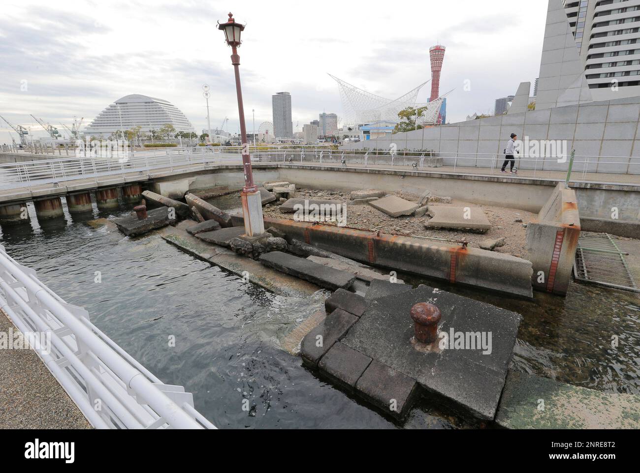 A picture shows a damaged quay wall at Port of Kobe Earthquake Memorial ...