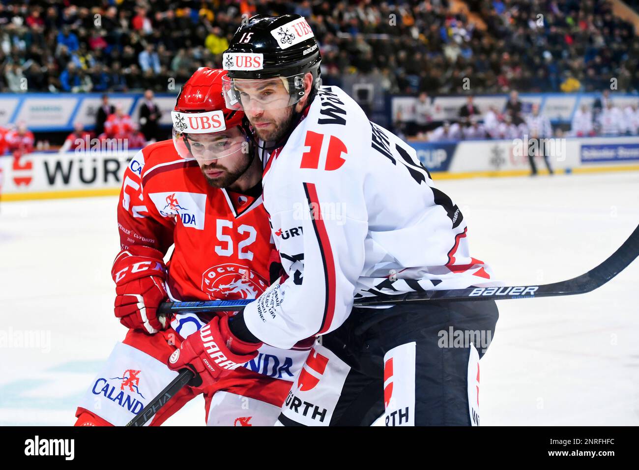 Trinec's Milan Doudera, left, and Canada's Dustin Jeffrey jockey for ...
