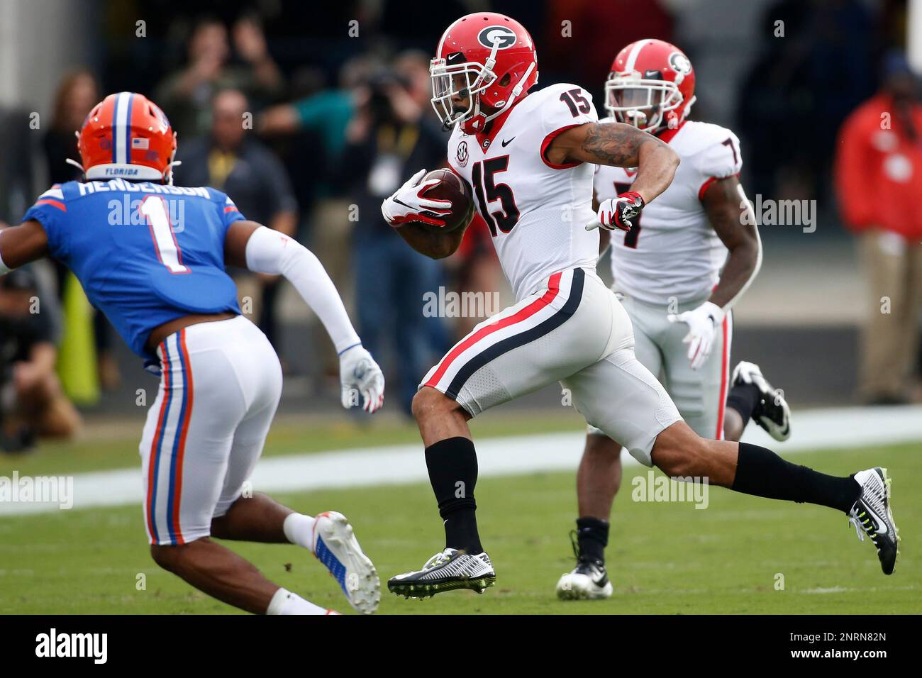 Georgia wide receiver Lawrence Cager (15) moves the ball down the field ...