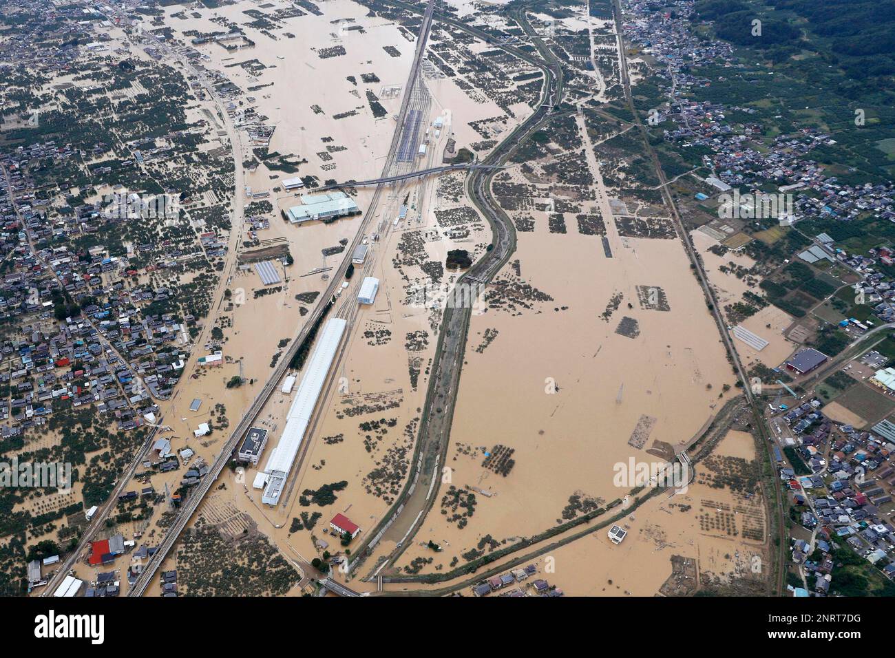 This photo shows a flooded area in Nagano, central Japan following ...
