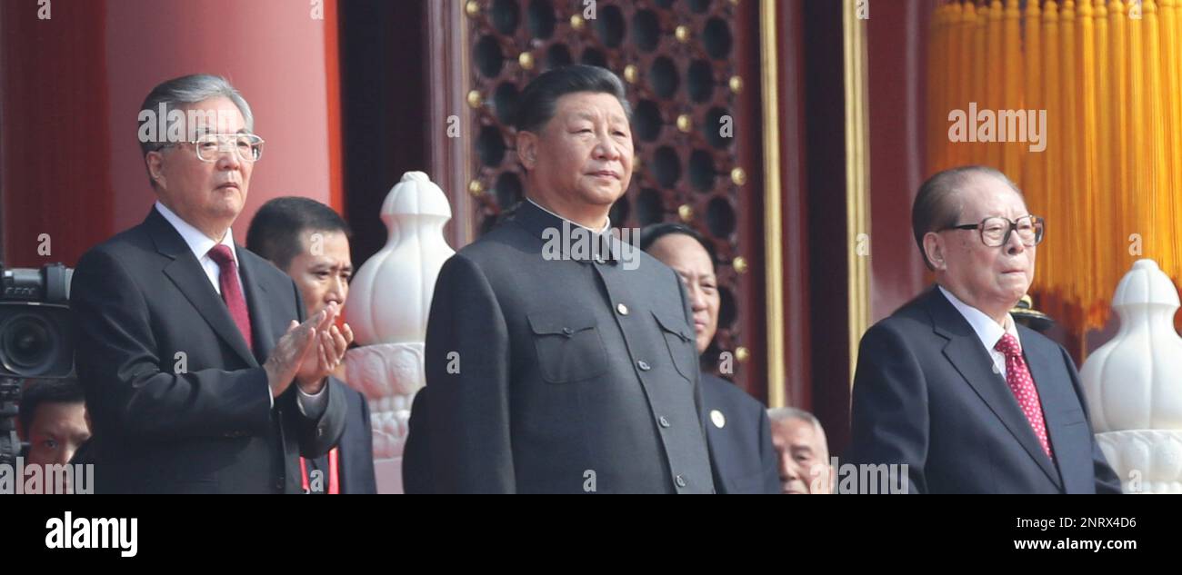 (L-R) China's former President Hu Jintao, current President Xi Jinpin ...