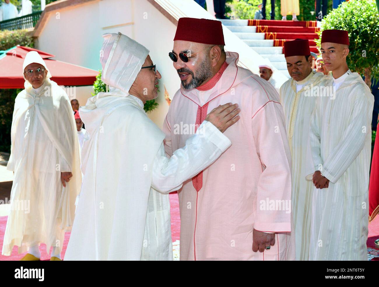 In this photo provided by the Moroccan Royal Palace, Morocco's King ...