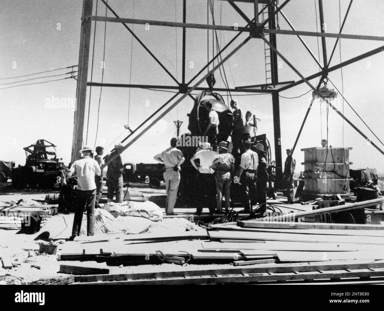 FILE - In this July 6, 1945, file photo, scientists and workmen rig the ...