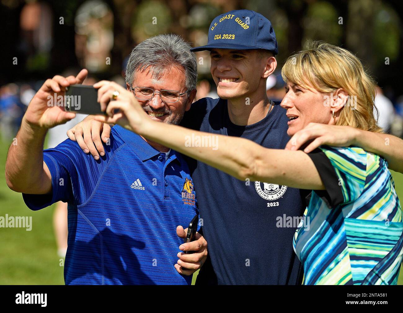 Swab Daniel Harbison, of Panama City, Florida, takes a photo with his ...