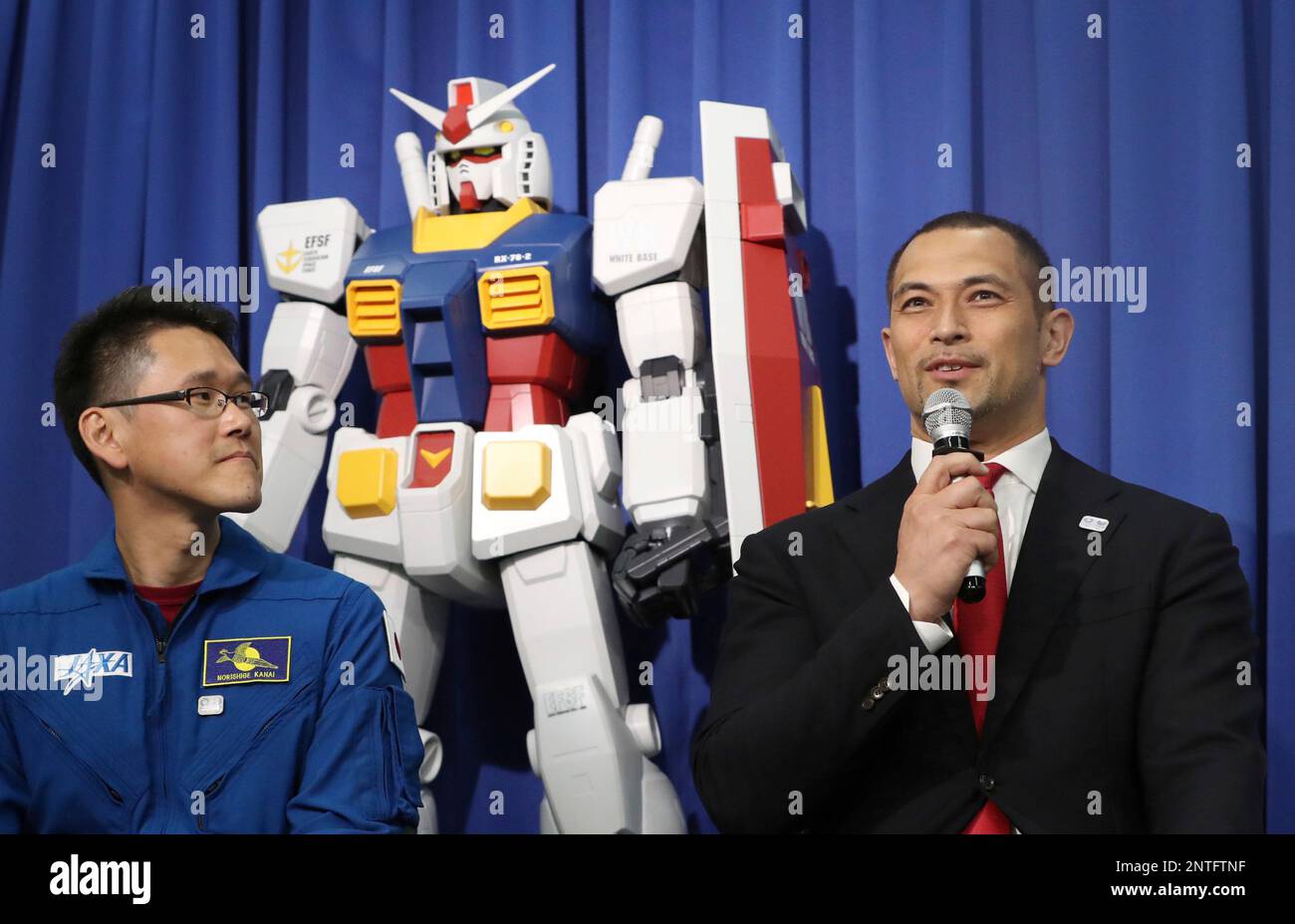 Japanese astronaut Norishige Kanai (L) and Tokyo 2020 Organising Committee Sports Director Koji ...