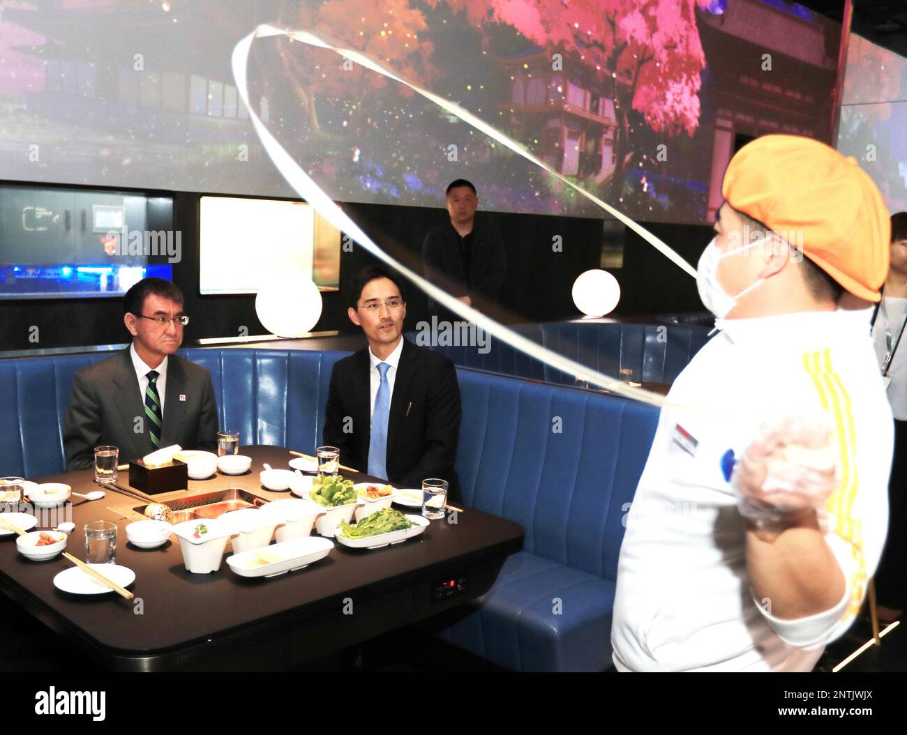 Japan's Foreign Minister Taro Kono visits a hot pot restaurant ...