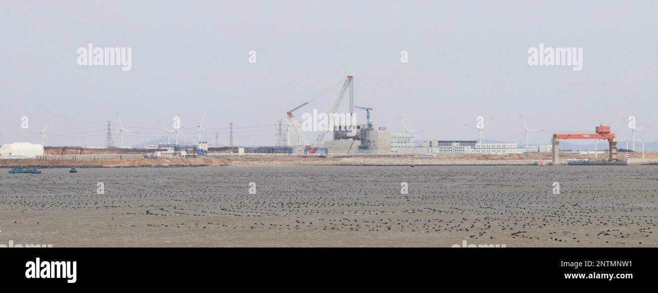 A photo shows Shidao Bay Nuclear Power Plant under construction in ...