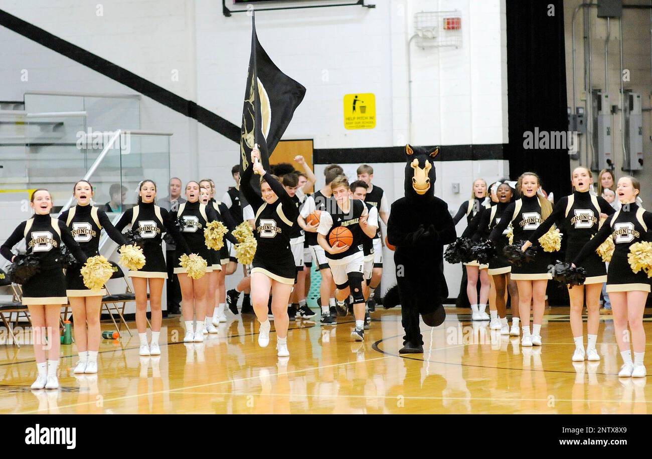Cheerleader Eve Emery and mascot David Shellabarger lead the Broncos on ...
