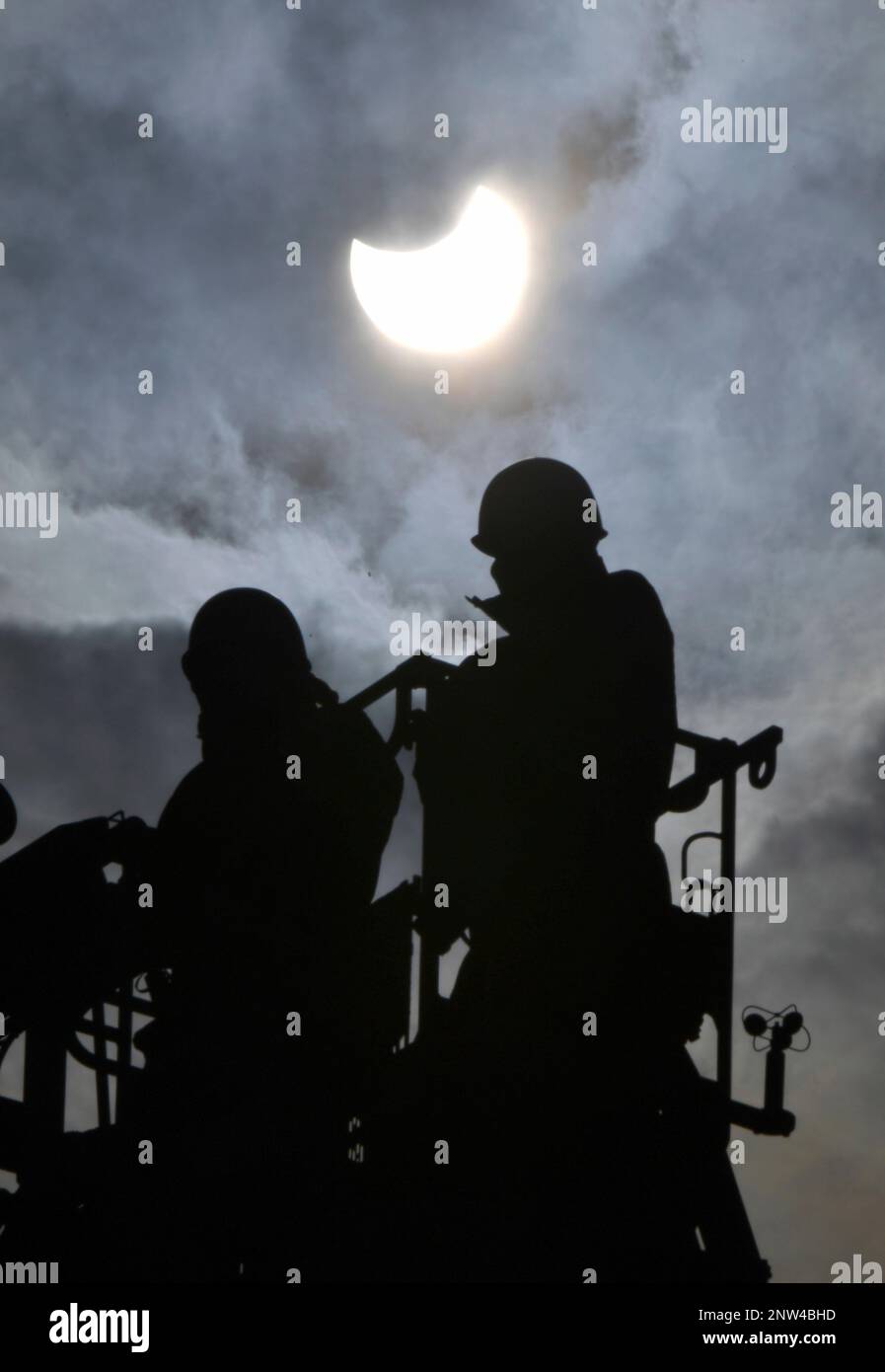 A photo shows a partial solar eclipse observed in Tokyo on Jan. 6, 2019 ...