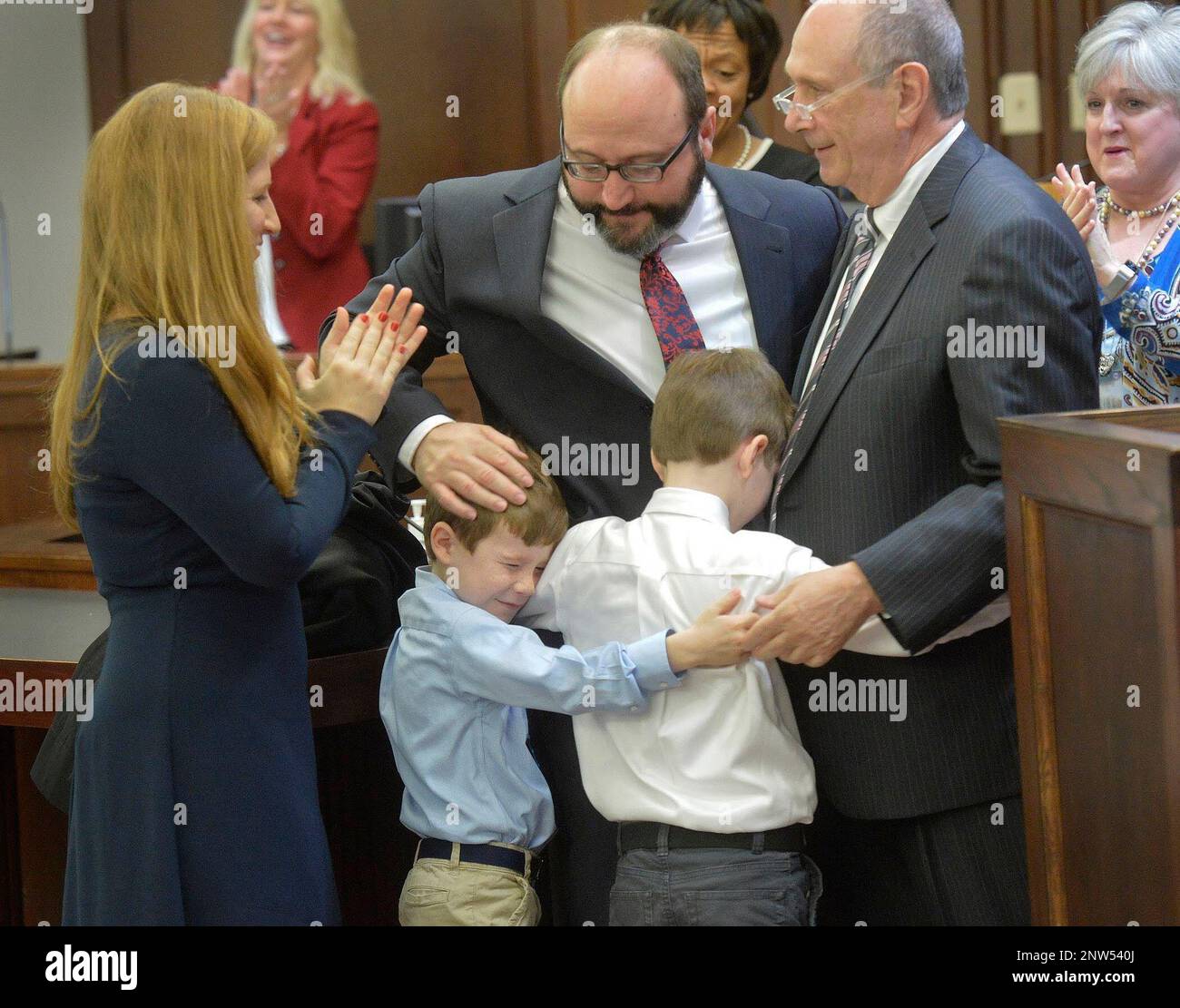 New Chatham County Superior Court Judge Benjamin Karpf, center ...