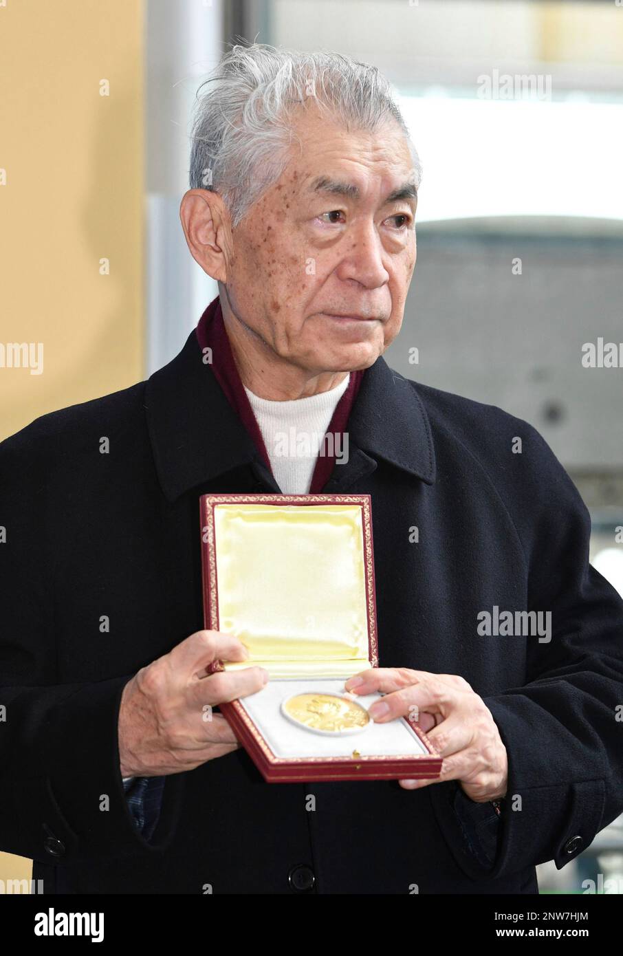 Tasuku Honjo, a distinguished professor at Kyoto University, holding ...